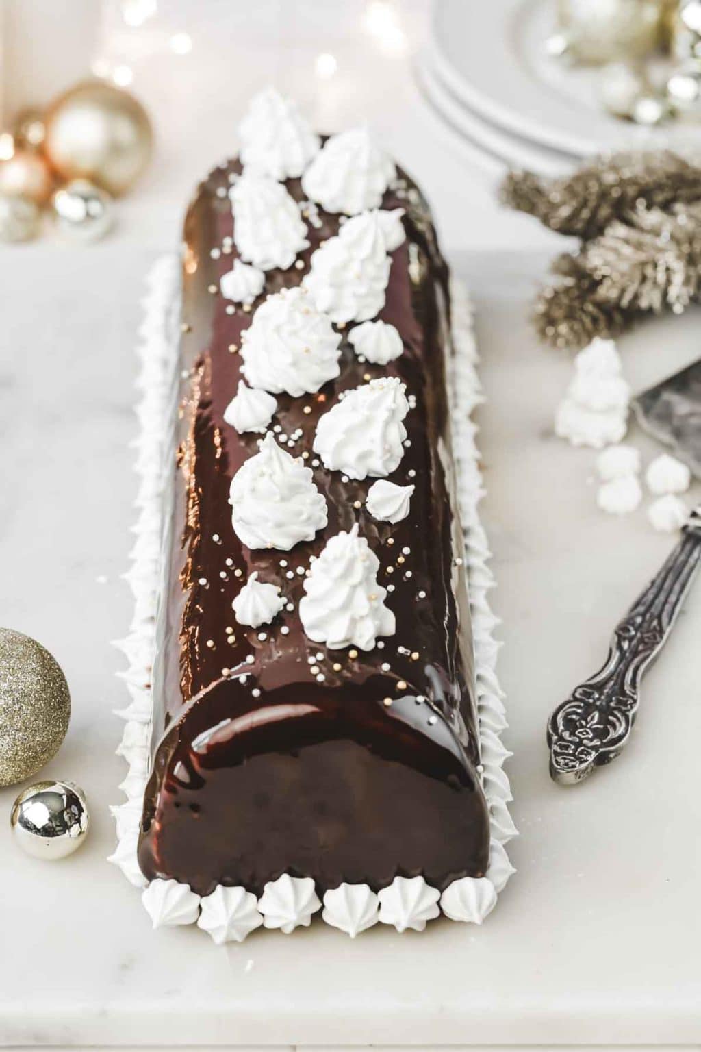 Triple Chocolate Log Cake with Chocolate Glaze and Meringues