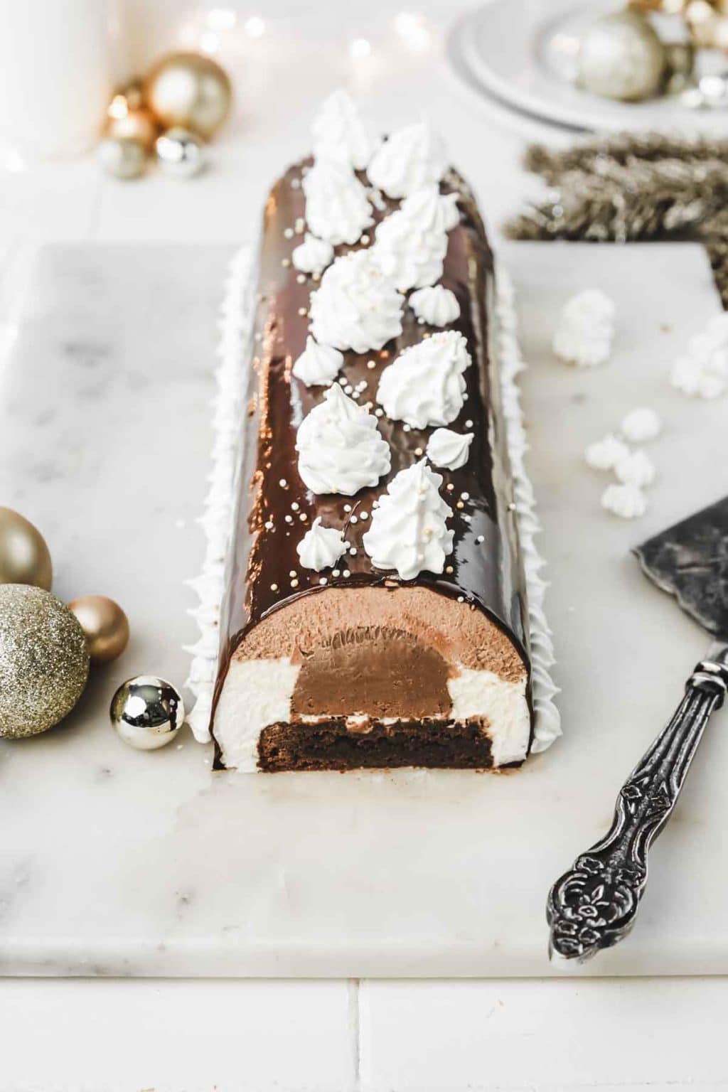 Triple Chocolate Log Cake with Chocolate Glaze and Meringues